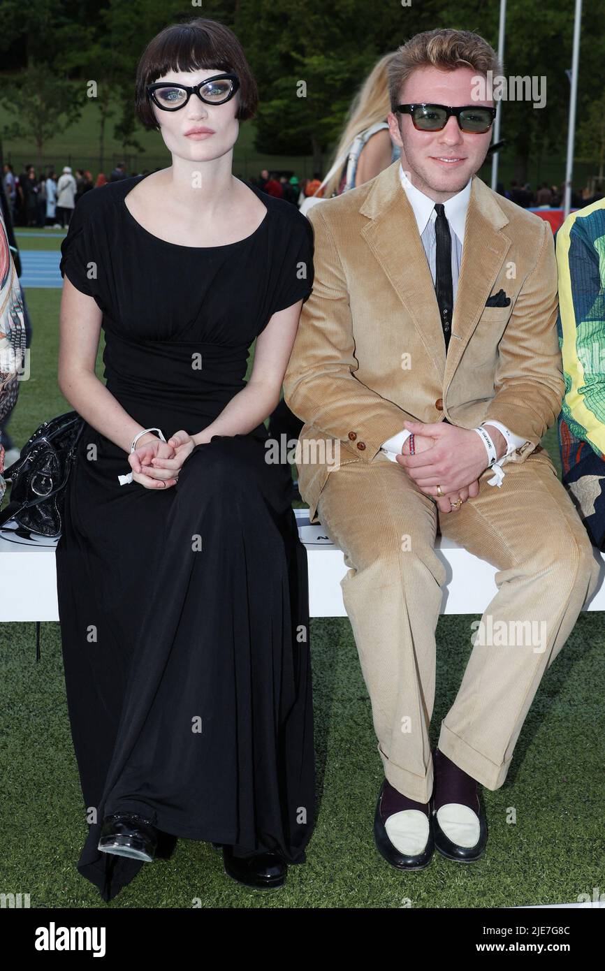 Rocco Ritchie and Guest attending the Marine Serre Front Row Menswear ...
