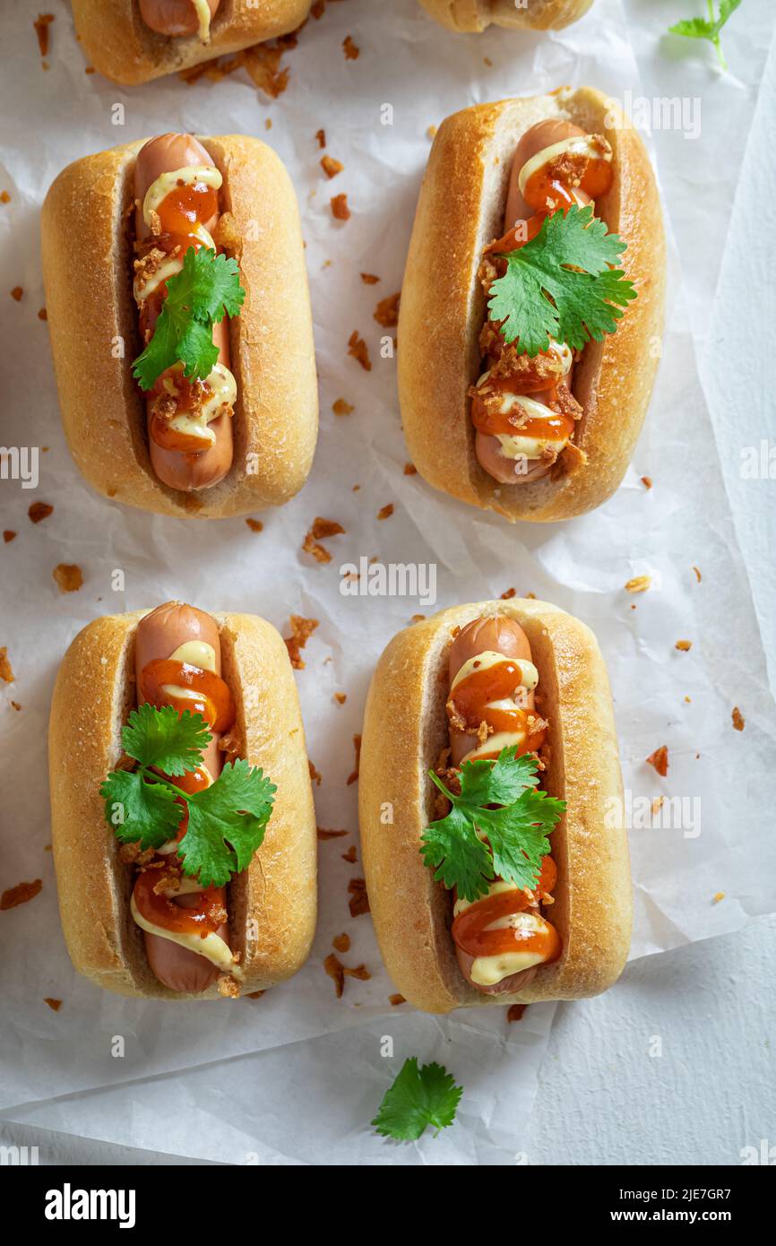 Hot and homemade mini hot dogs as quick appetizers. Mini hot dogs with ...