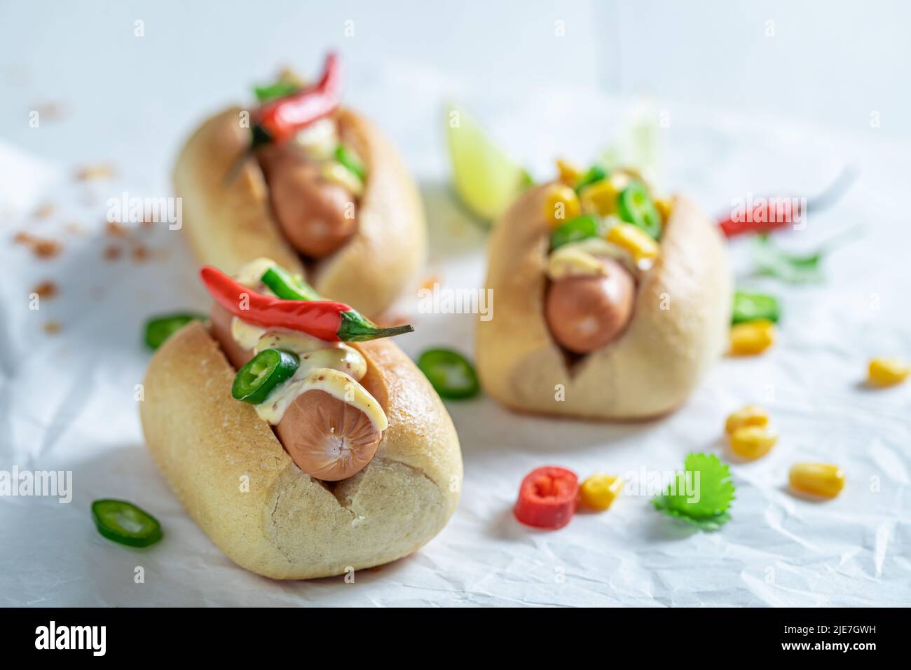 Fresh and tasty mini hot dogs with sausage and sauce. Mini hot dogs ...