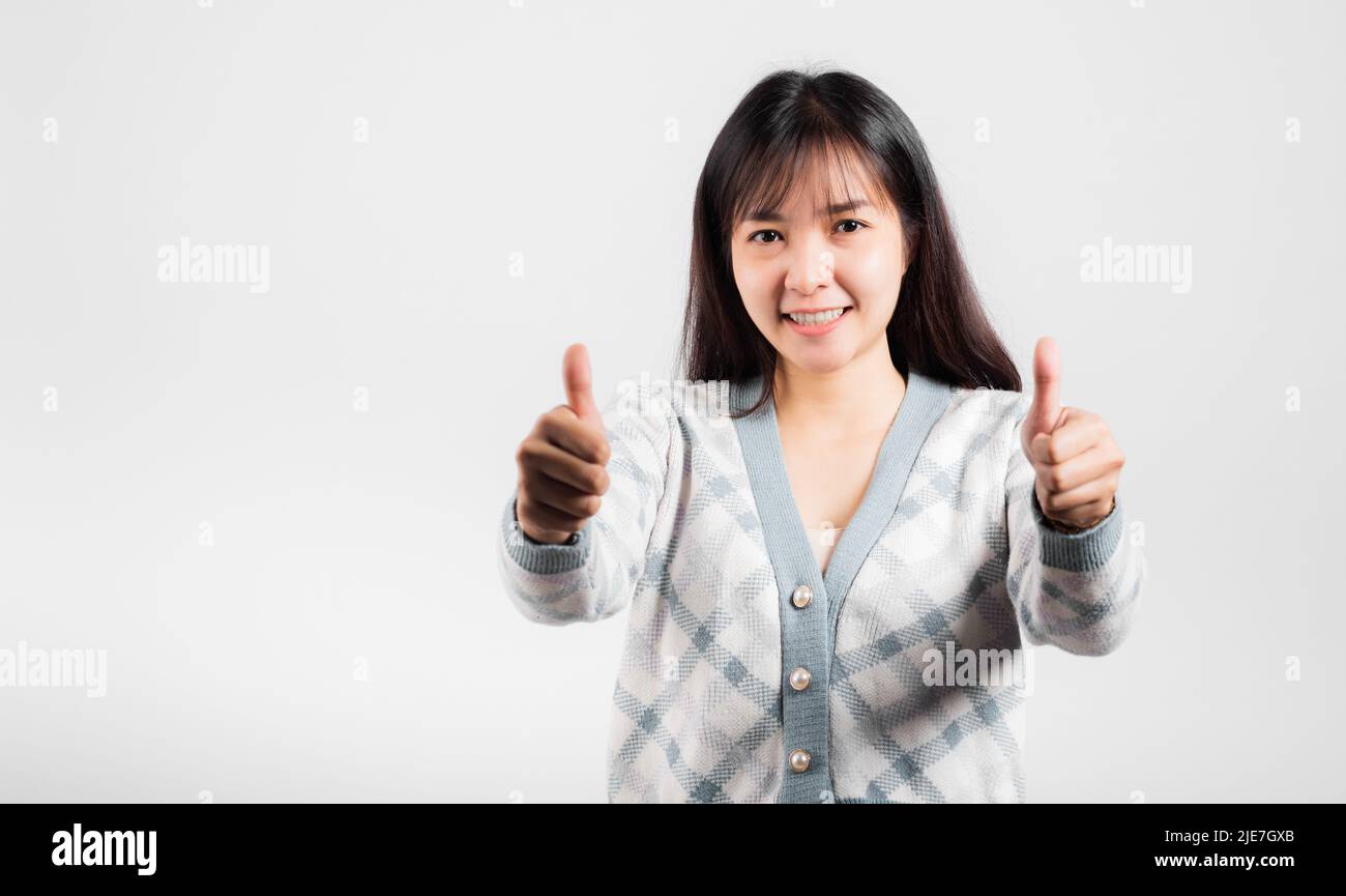 Happy woman smile showing finger thumbs up, Portrait Asian beautiful ...