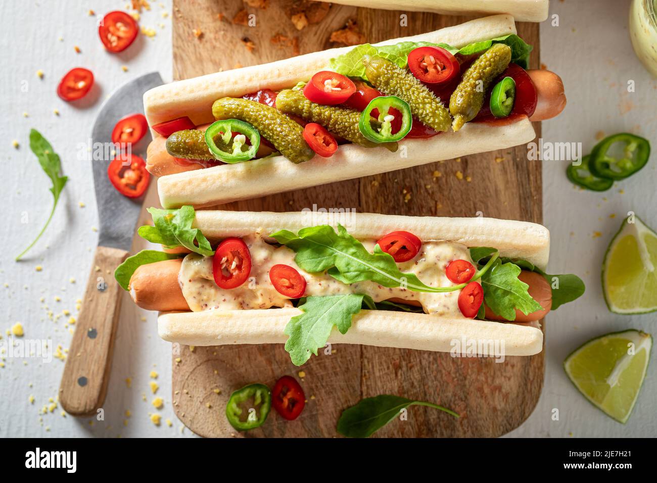 Unhealthy and tasty hot dogs as appetizers for summer party. Hot dogs ...