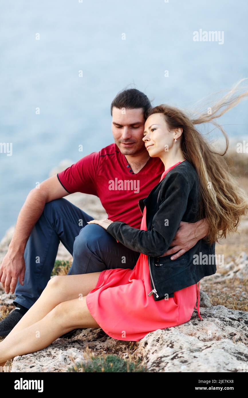 Portrait of lovely middle-aged couple looking aside at copyspace and ...