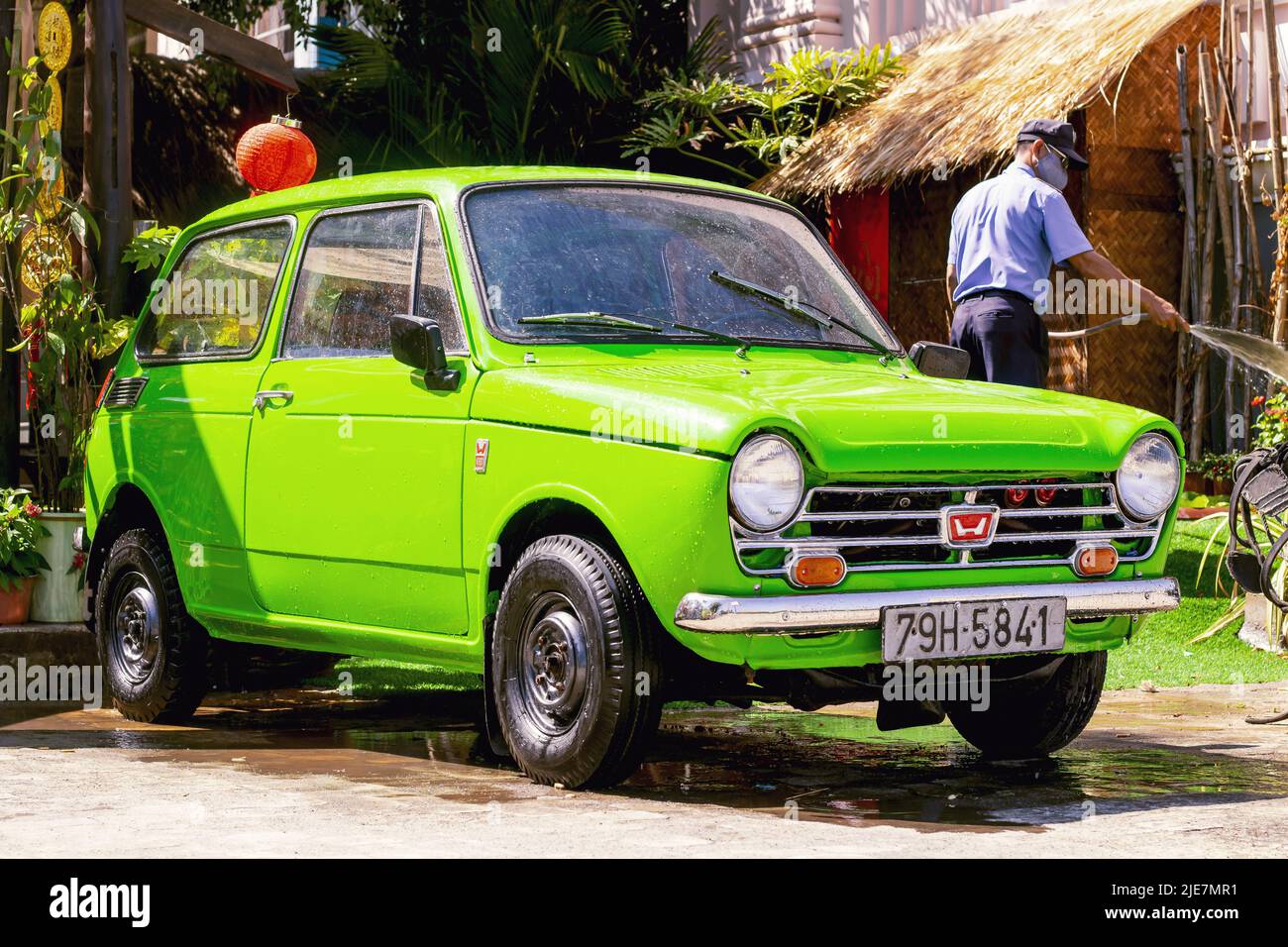 Nha Trang, Vietnam - June 23, 2019: An old green Honda N360 stands in a ...