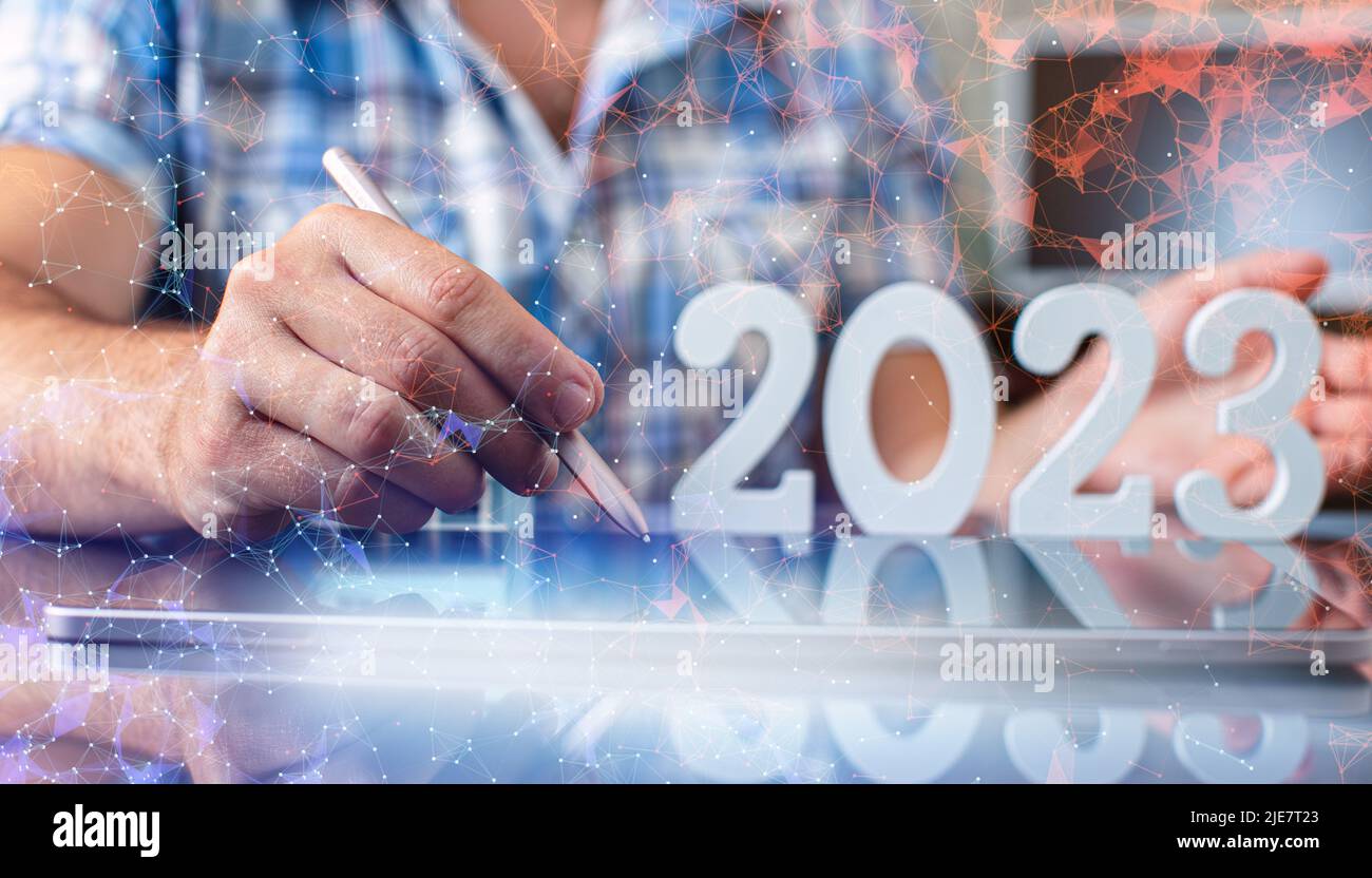 Hand write on tablet and touch screen. Stock market 2023 concept ...