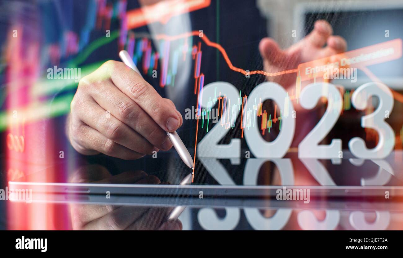 Hand write on tablet and touch screen. Stock market 2023 concept ...