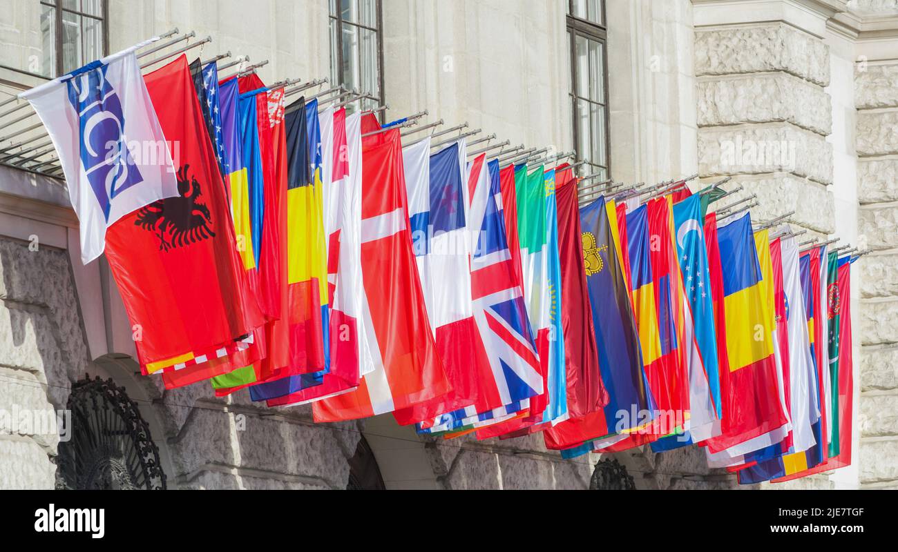 Flags of different countries on the building, horizontal format Stock ...