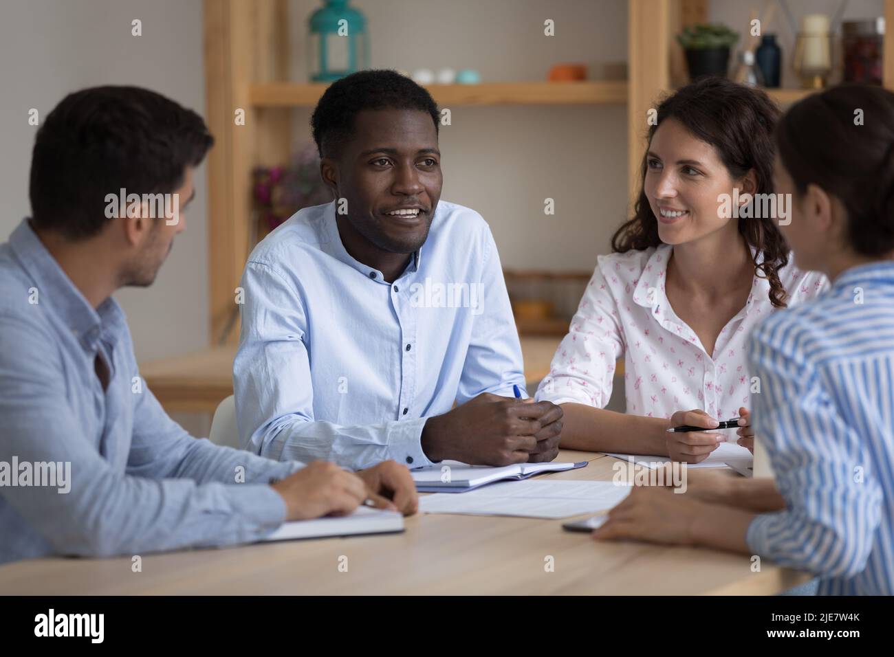 Group young diverse managers hi-res stock photography and images - Alamy
