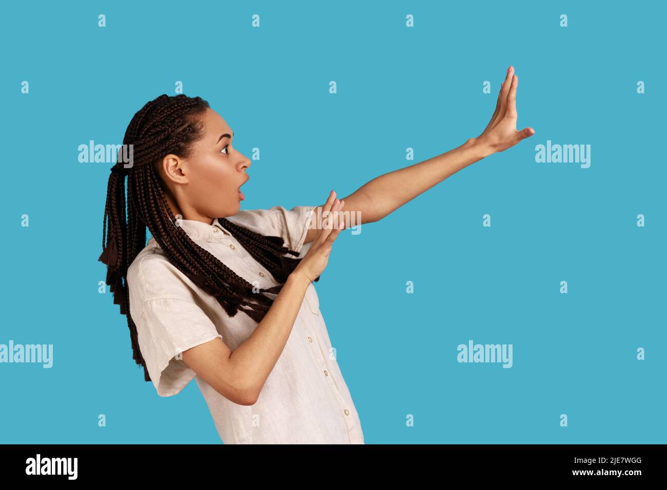 Side view portrait of frightened woman tries to protect herself from ...
