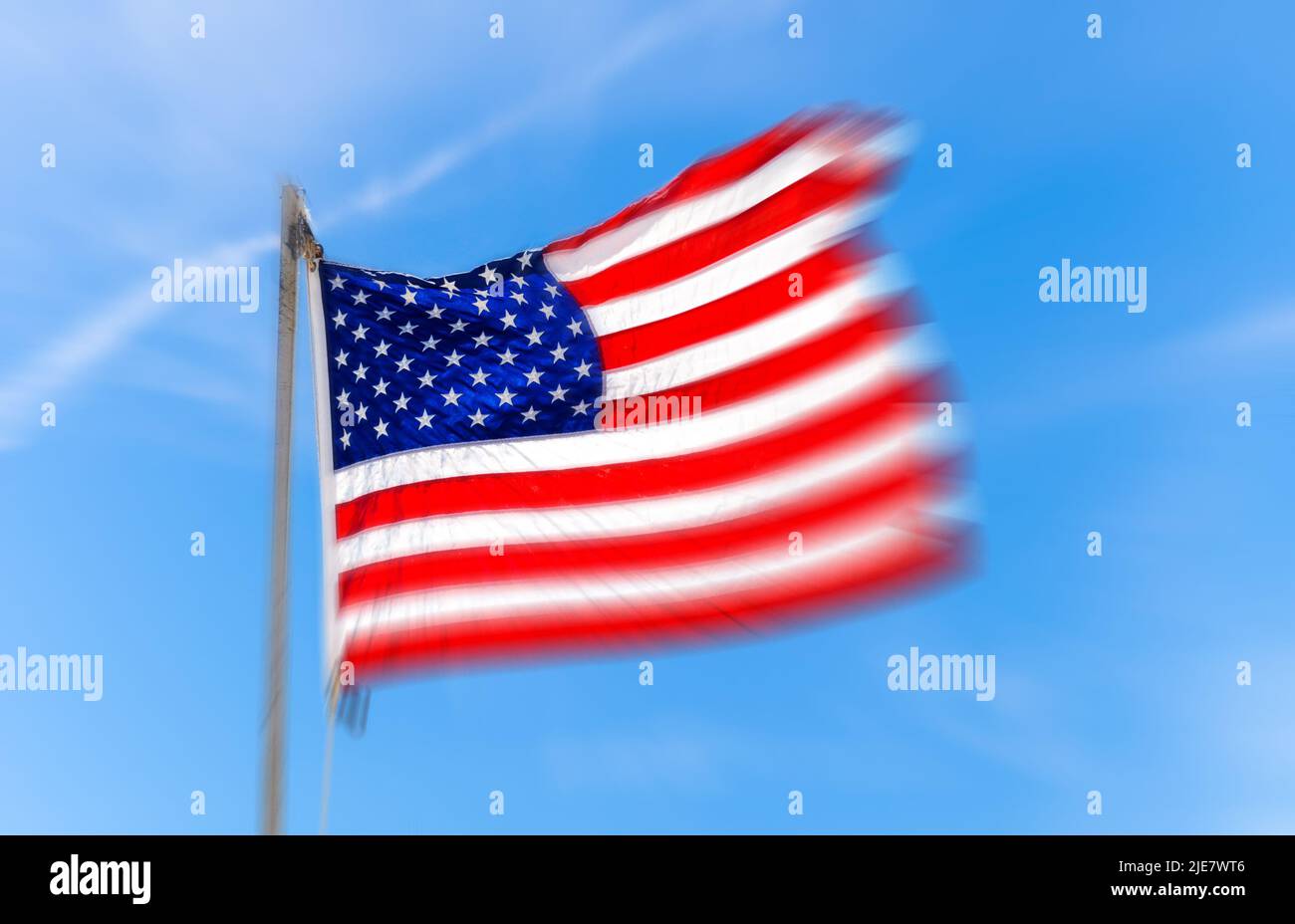 Close up Flag of United States of America waving in the wind with ...