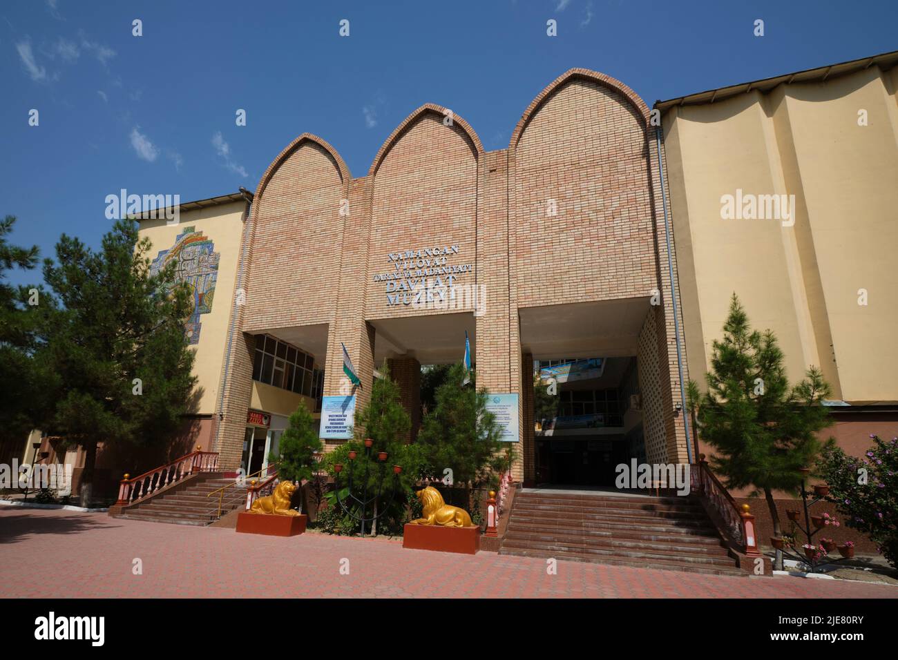The front entrance, with gold painted lions, of the Museum of History ...