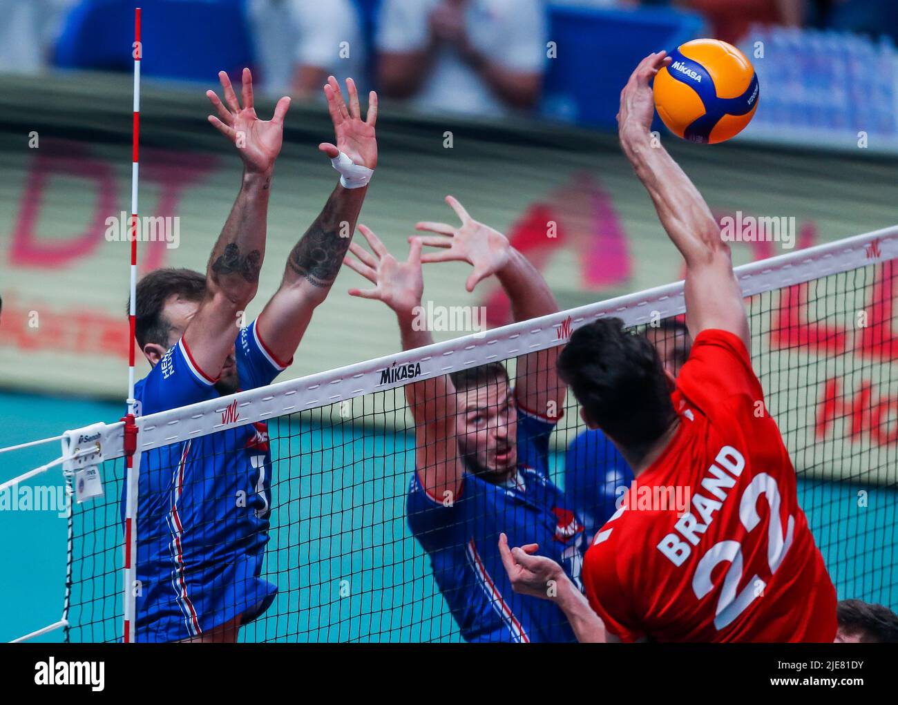 Quezon City. 26th June, 2022. Germany's Tobias Brand (R) spikes the ...