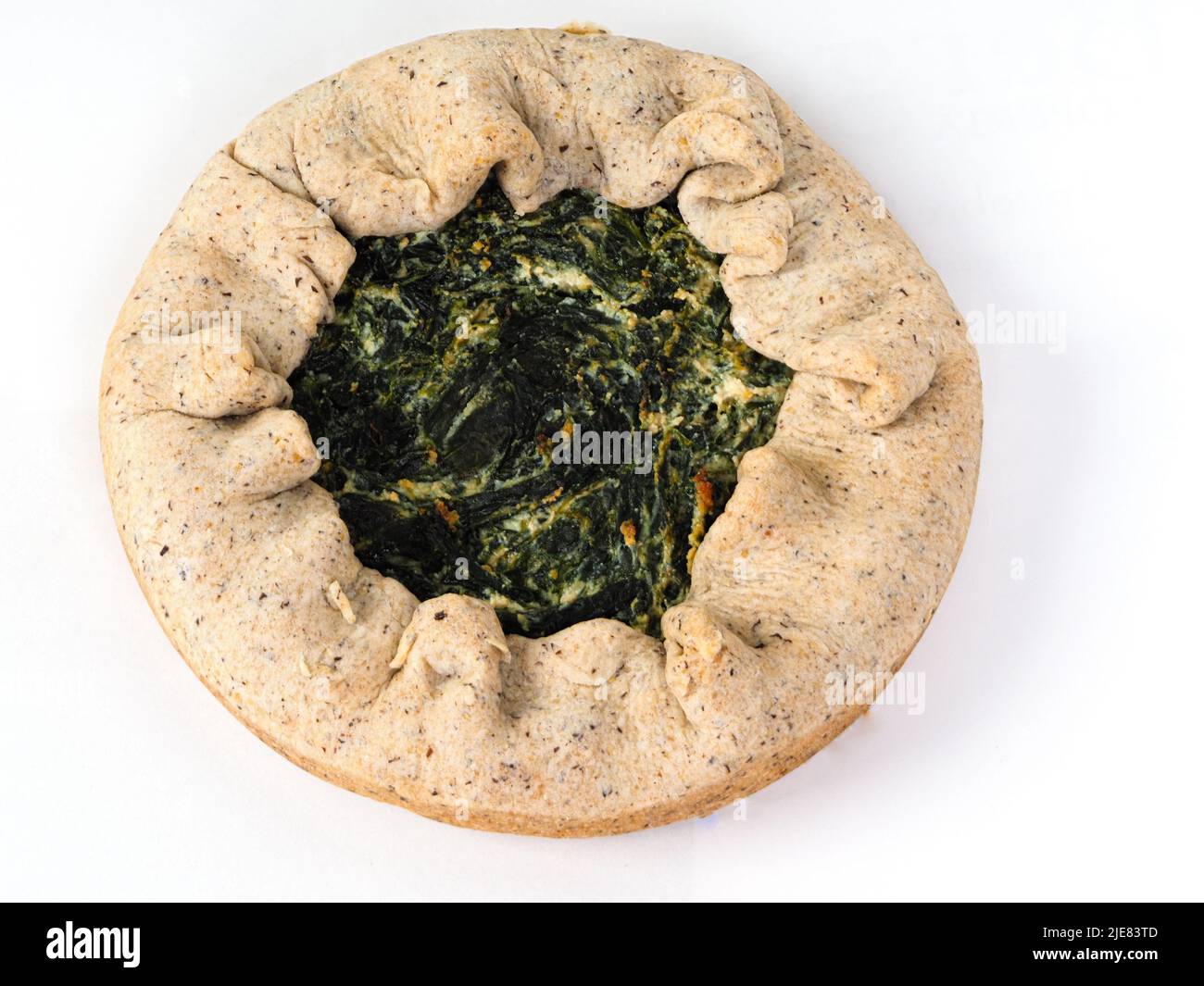 Homemade spinach and cheese small pie in slices from above Stock Photo ...