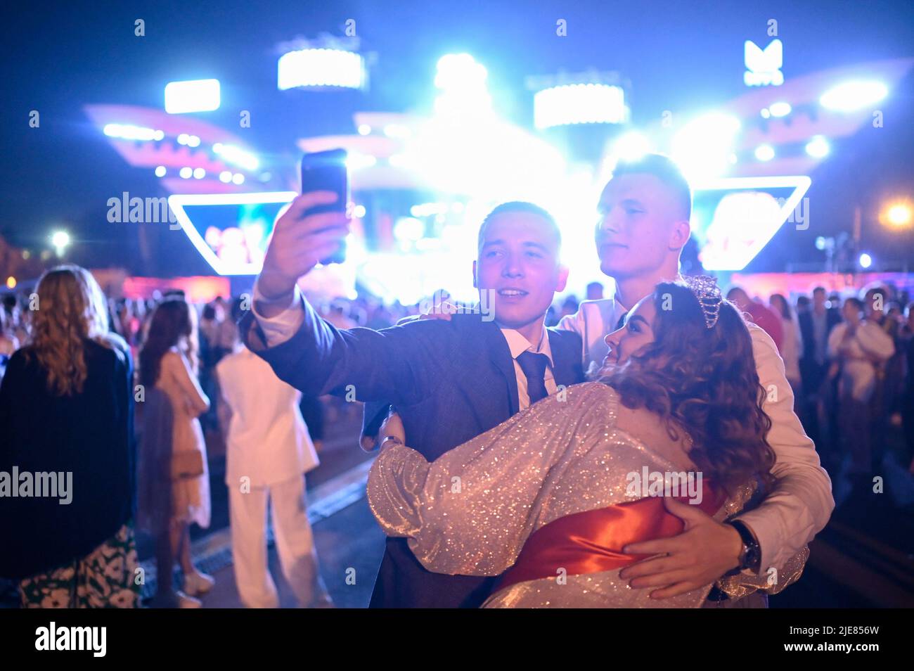 Moscow, Russia. 26th June, 2022. Graduates take selfies during a ...