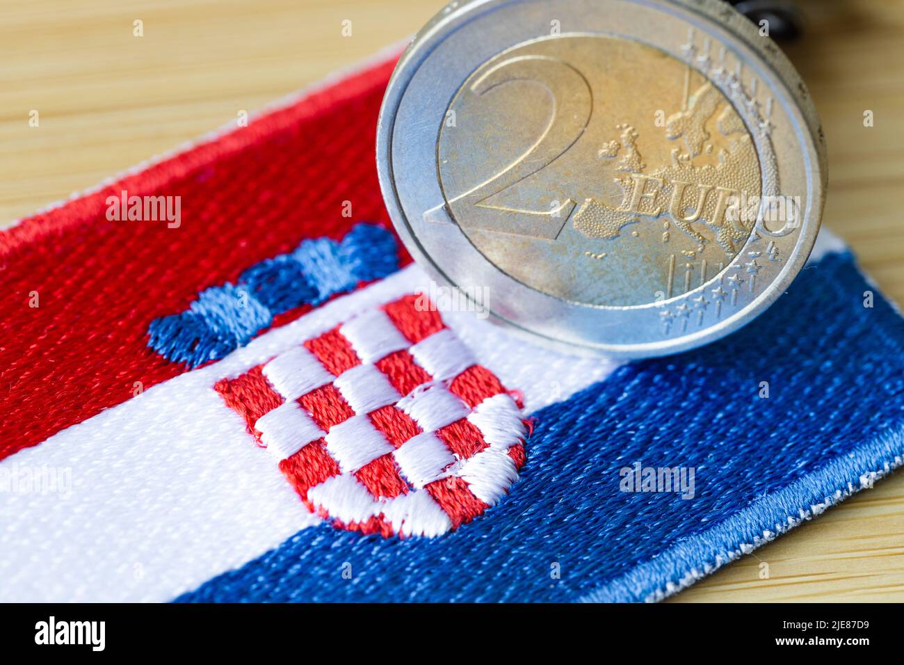 Croatian flag next to the 2-euro coin. Concept of Croatia joining the ...