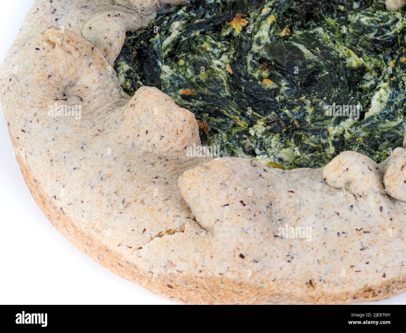 Homemade spinach and cheese small pie in slices for 1 person Stock ...