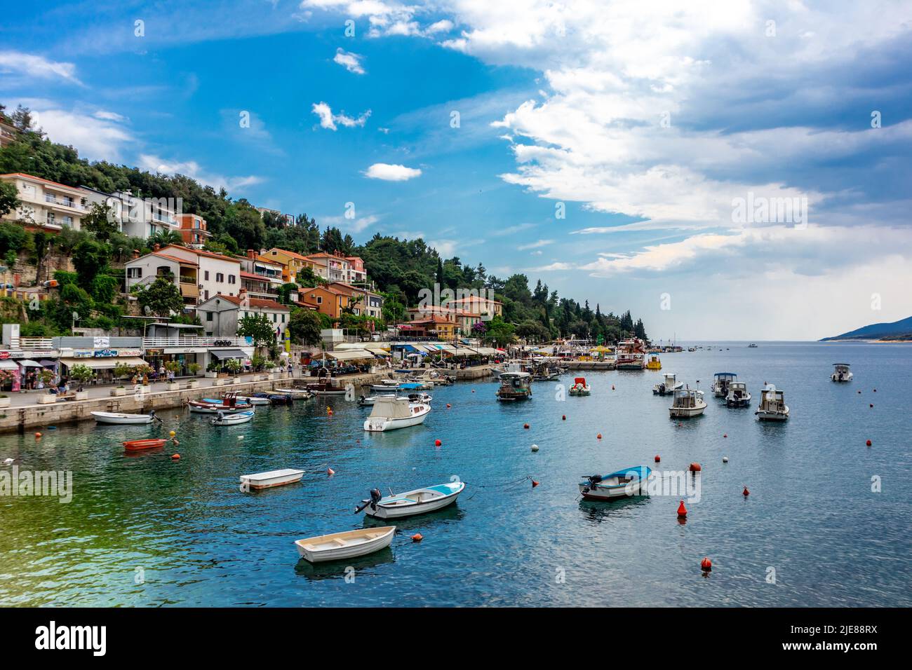 Summer beach walk in the port town of Rabac - Istria - Croatia Stock ...