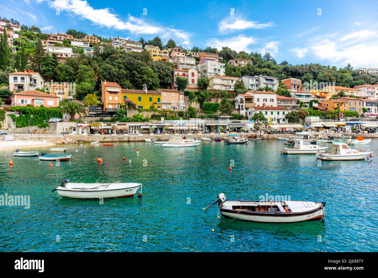 Summer beach walk in the port town of Rabac - Istria - Croatia Stock ...