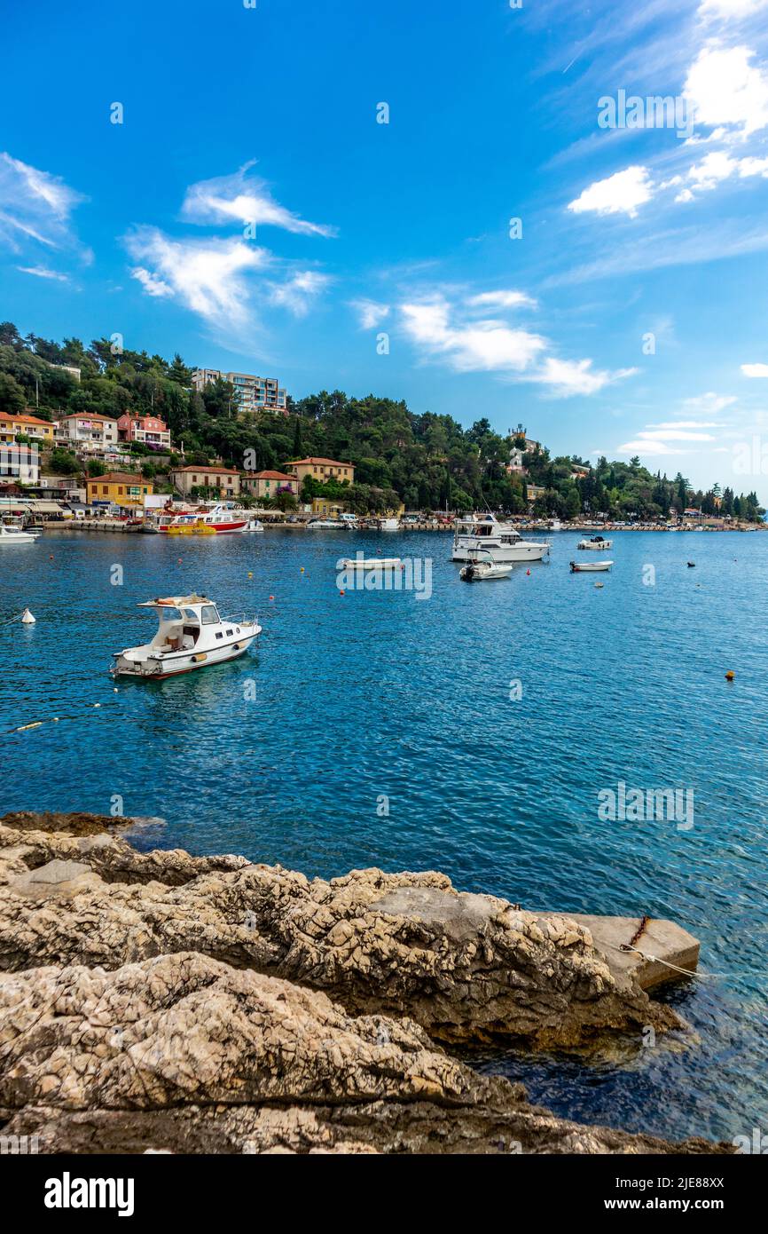 Summer beach walk in the port town of Rabac - Istria - Croatia Stock ...