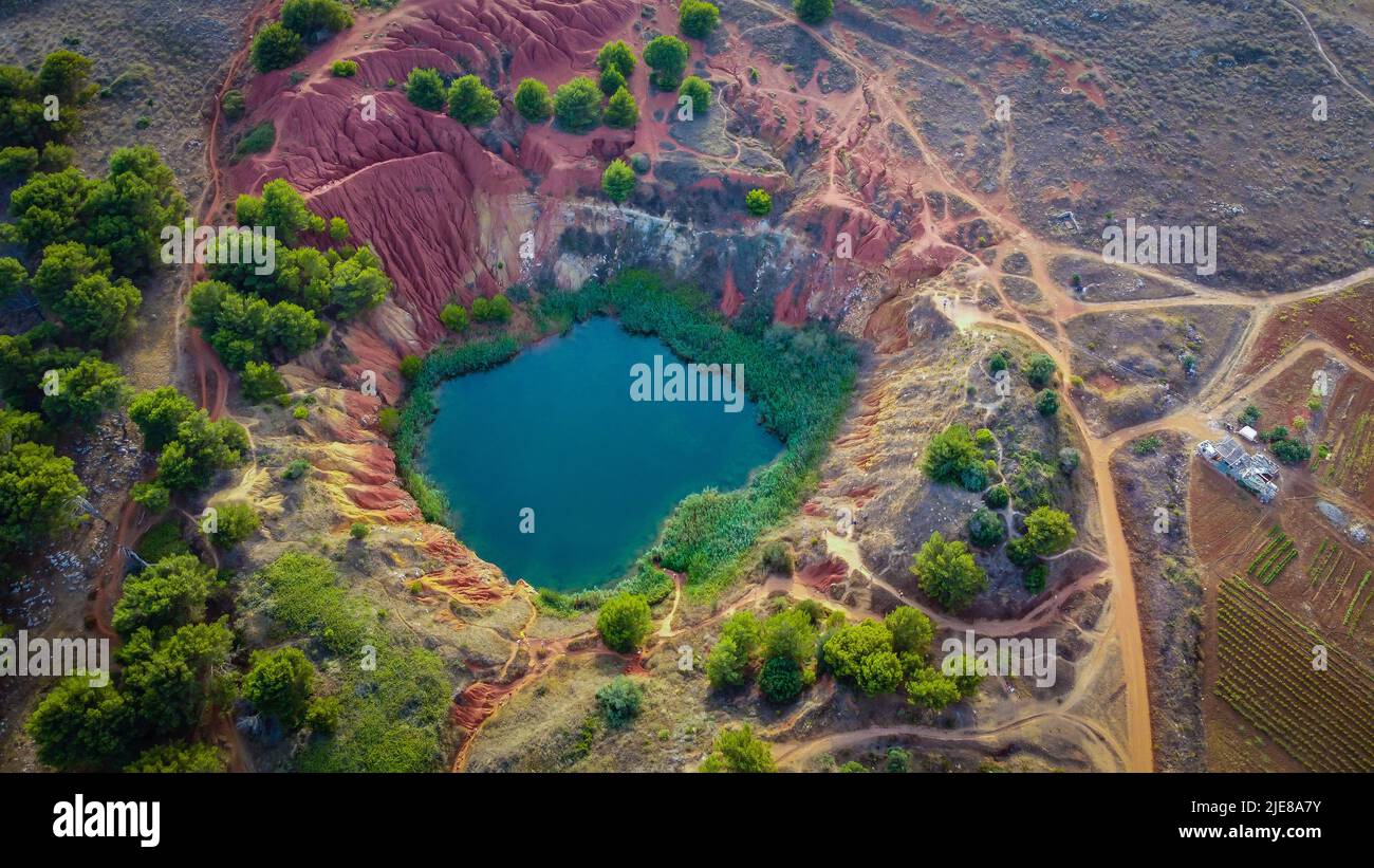 view of the lake of former open-pit bauxite mine near Otranto - Apulia ...