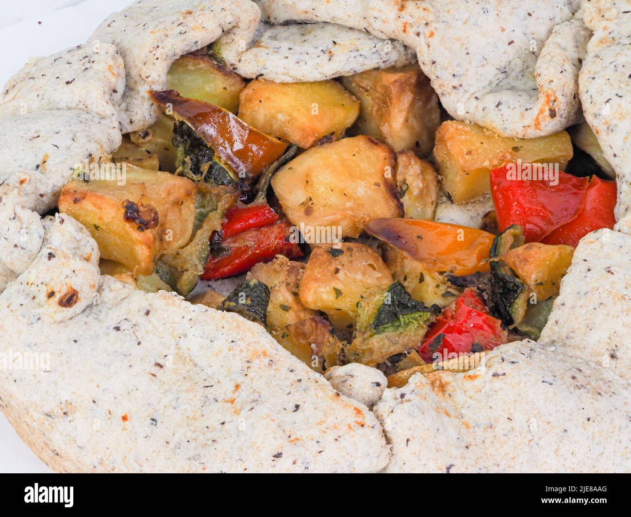 Vegan small veggie pie in slices for 1 person Stock Photo - Alamy