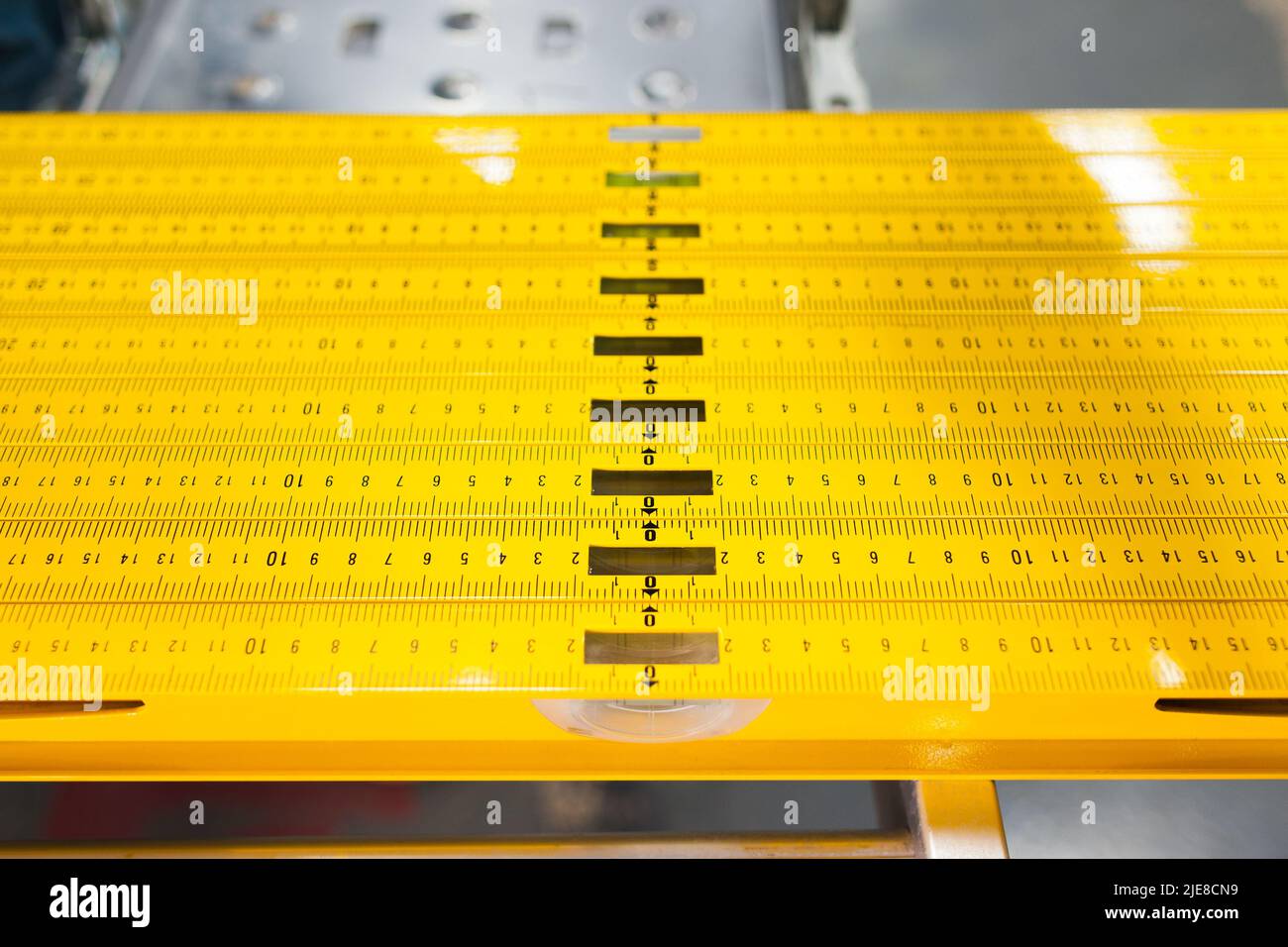 Construction level ruler display on tools store Stock Photo - Alamy