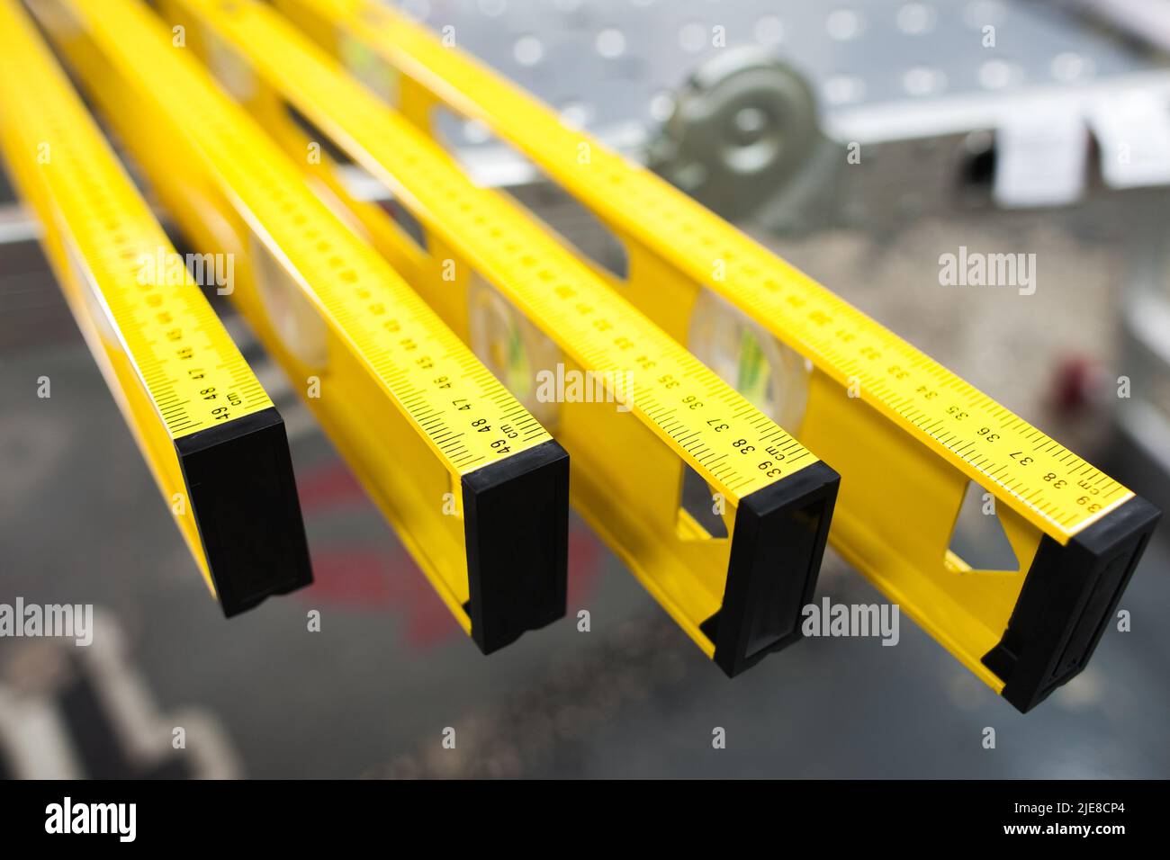 Construction level ruler display on tools store Stock Photo - Alamy