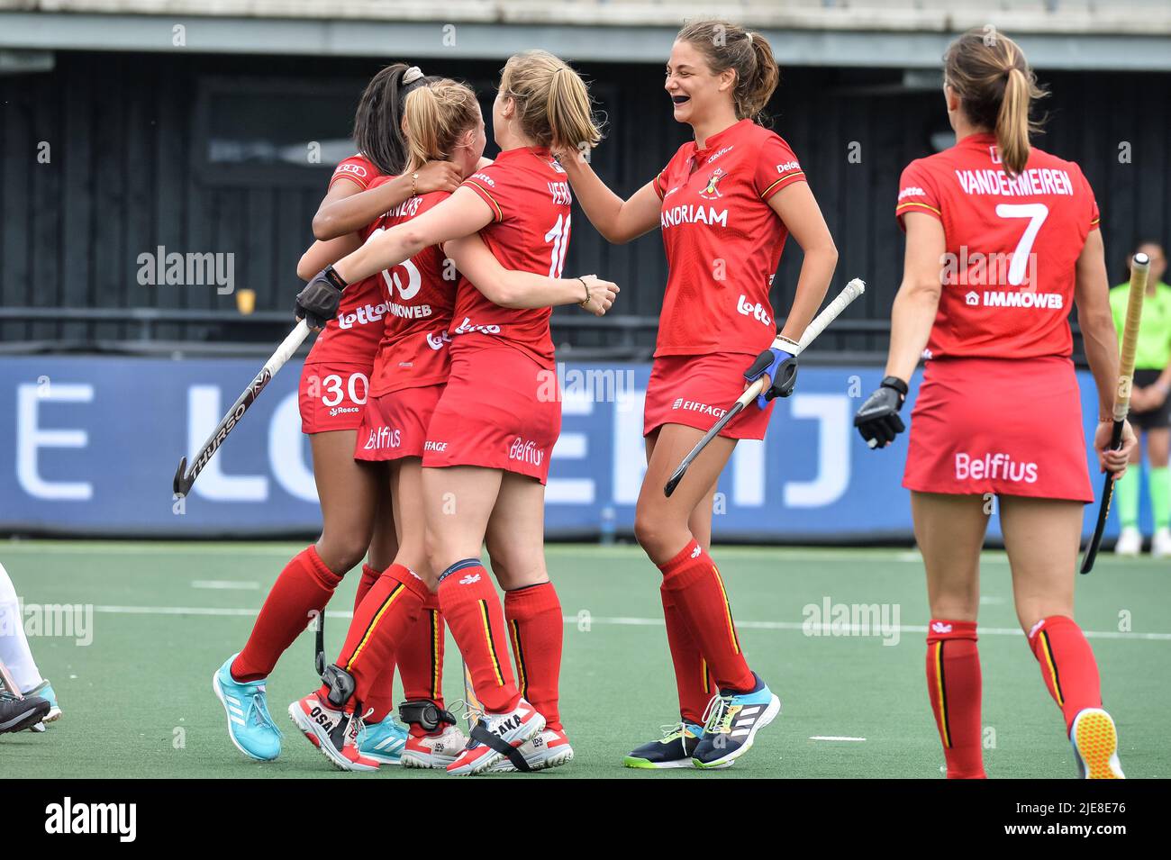 Players of Belgium celebrate after scoring a goal during a hockey match ...