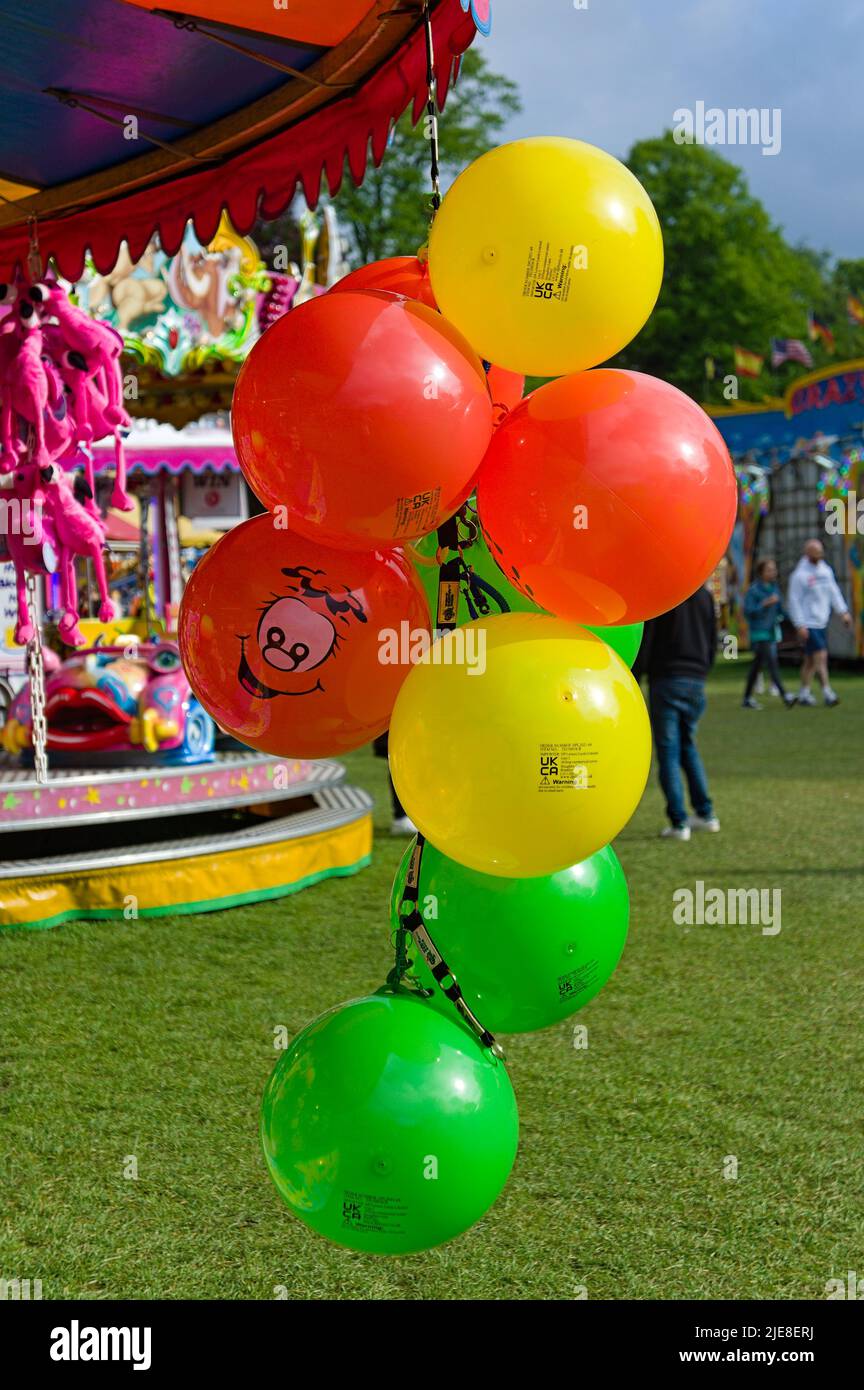 Funfair carnival balloon bunch hi-res stock photography and images - Alamy