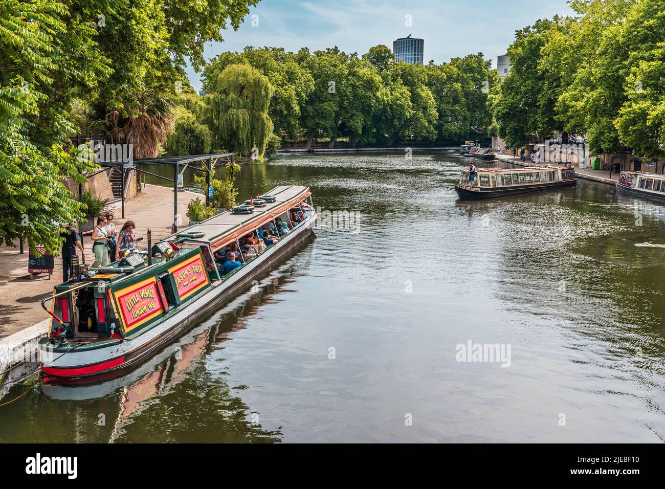 Colorful typical narrowboats moored along Little Venice basin, near the ...