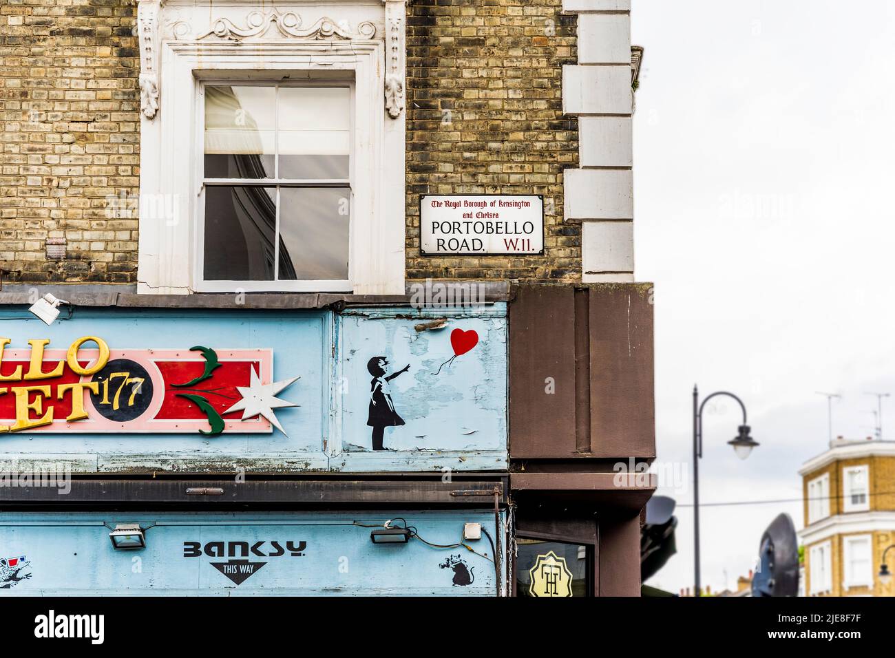 Street sign pointing the beginning of "Portobello Road" with British ...