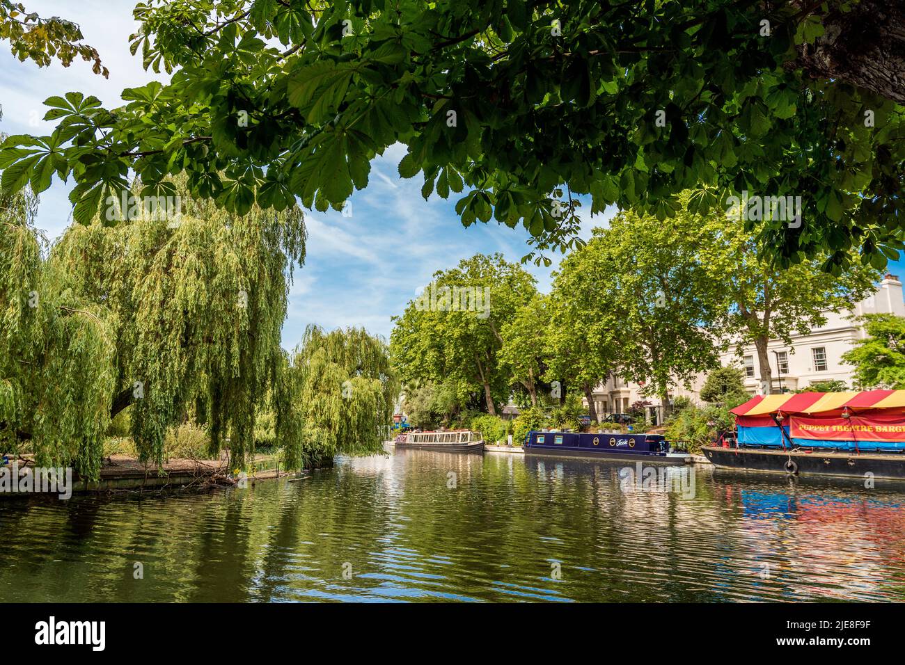 Colorful typical narrowboats moored along Little Venice basin, on the ...