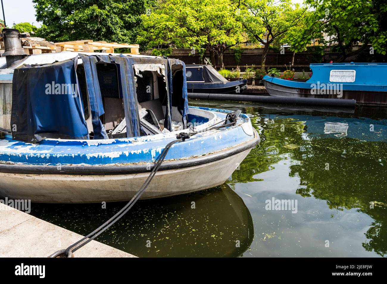 Colorful typical narrowboats moored along Little Venice basin, near the ...