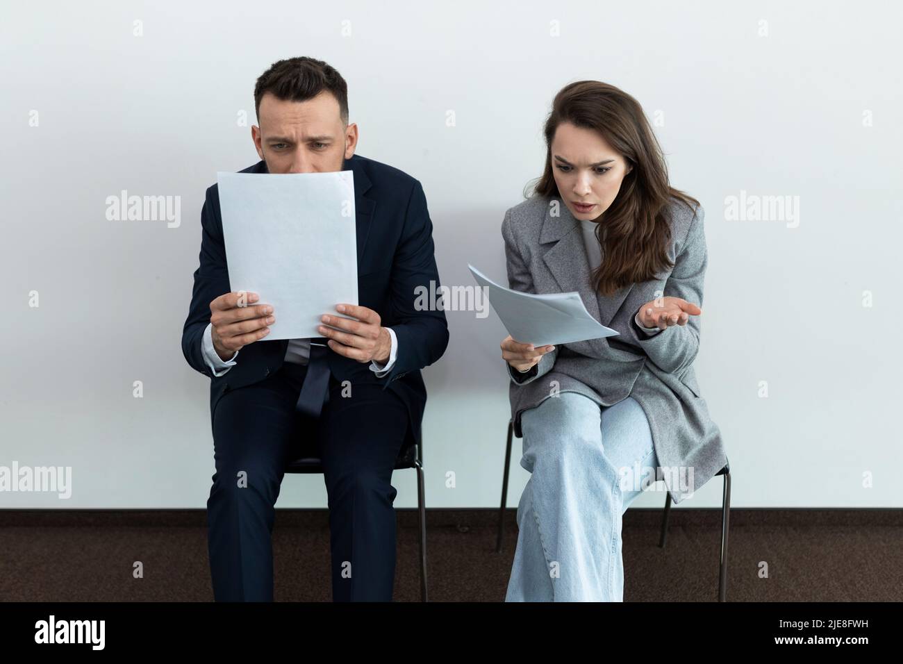 applicants before the interview prepare and worry while sitting on ...