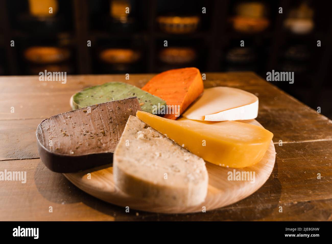 Mix of young Gouda, young goat, lavander cheese and green and red pesto ...