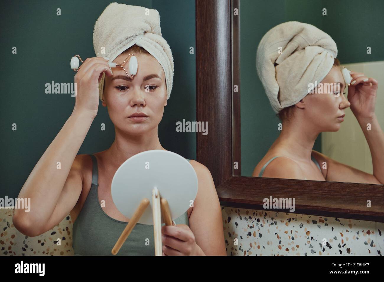 One young woman mirror face hi-res stock photography and images - Alamy