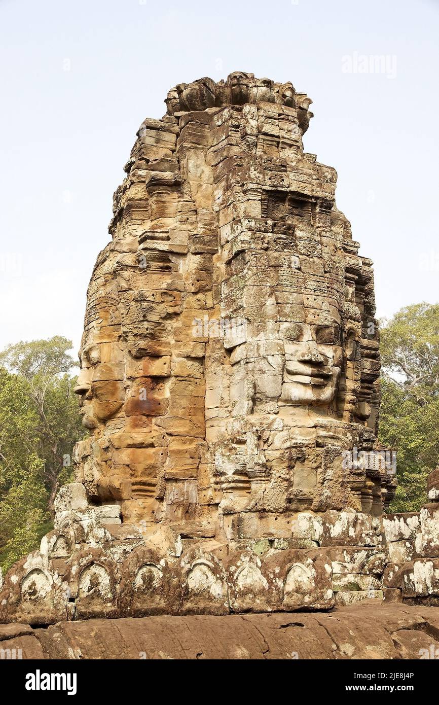 The smiling faces on the face tower at the Bayon temple upper terrace ...