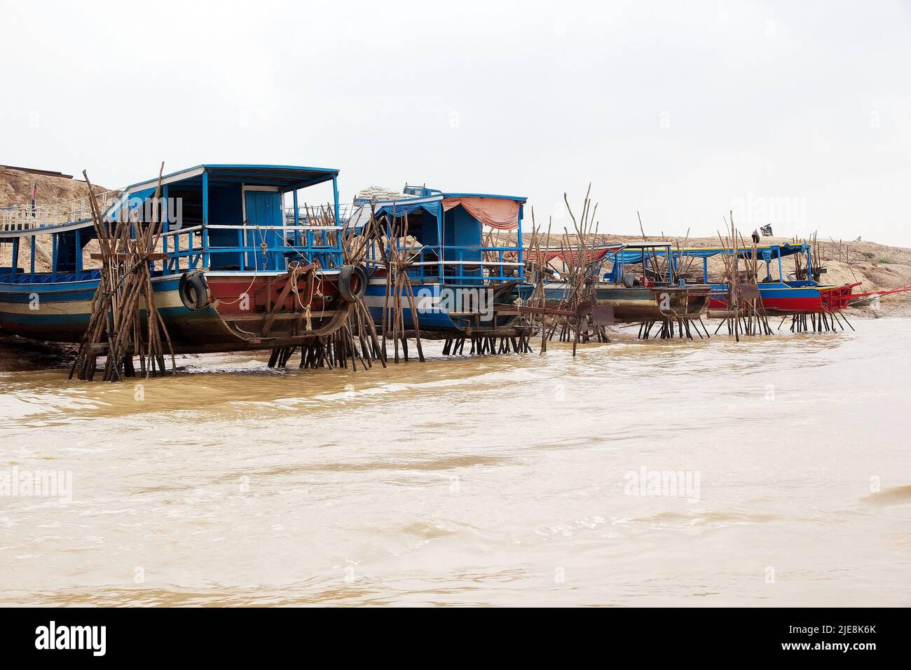 Traditional boats on the Tonle Sap lake, Cambodia. Tonle Sap is a ...