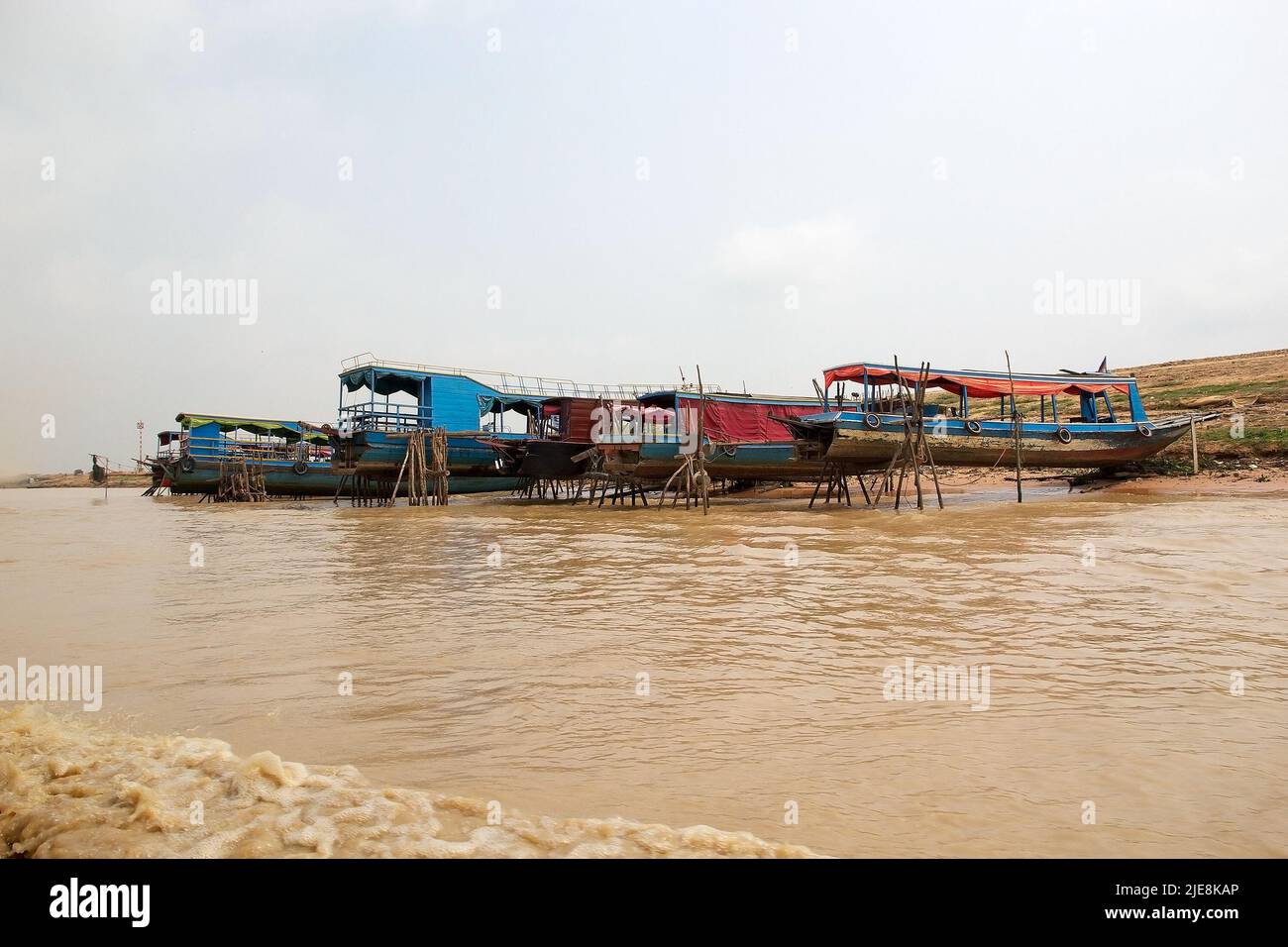 Traditional boats on the Tonle Sap lake, Cambodia. Tonle Sap is a ...