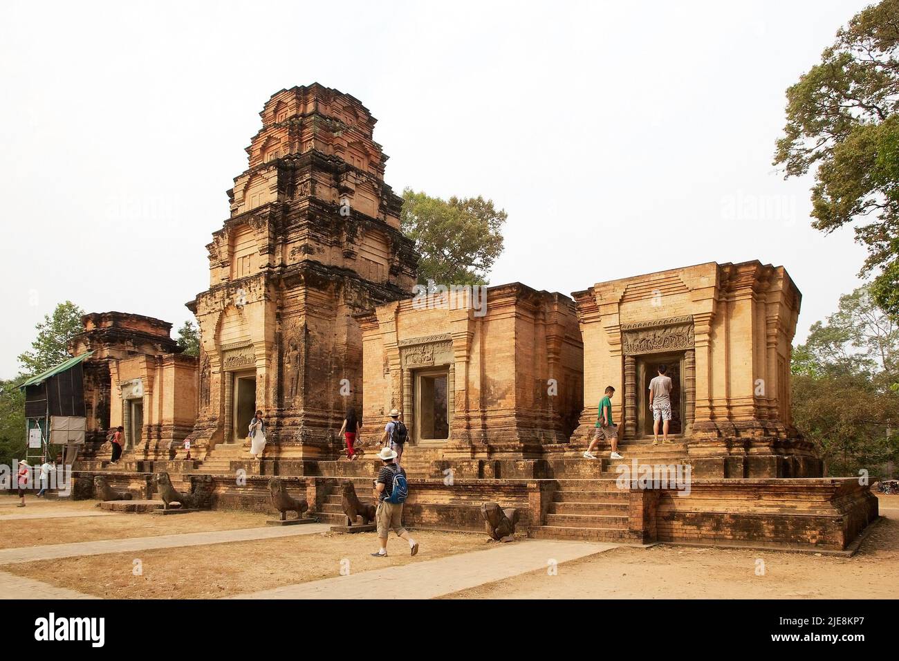 Tourists are visiting the Prasat Kravan temple ruins, Angkor, Siem Reap ...