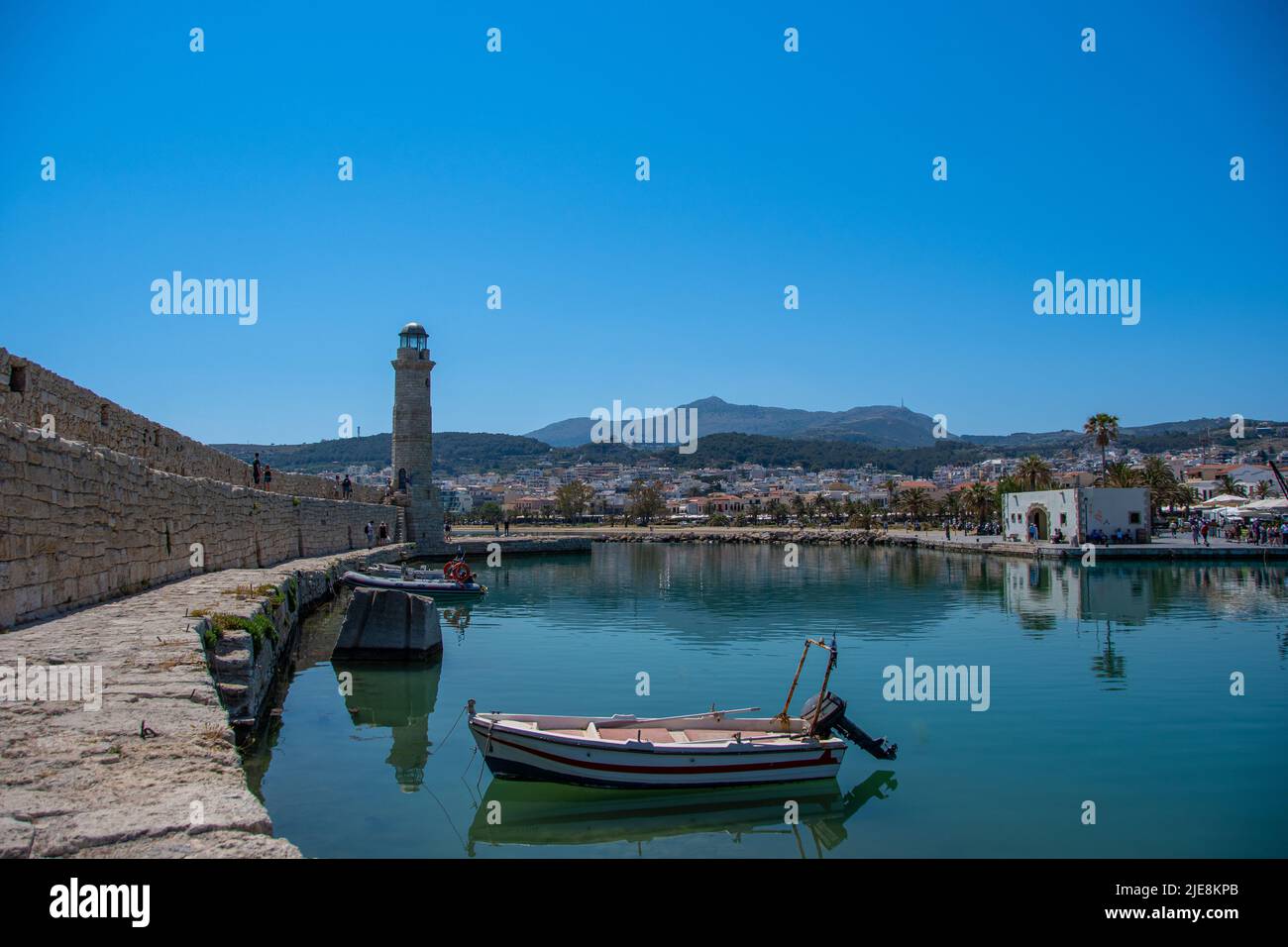 The lighthouse of Rethymno in the old Venetian port Stock Photo - Alamy