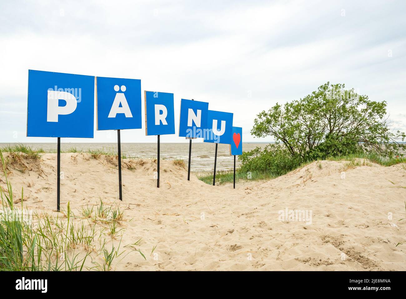 Parnu, Estonia Europe, name of the city on the sandy beach and dunes ...