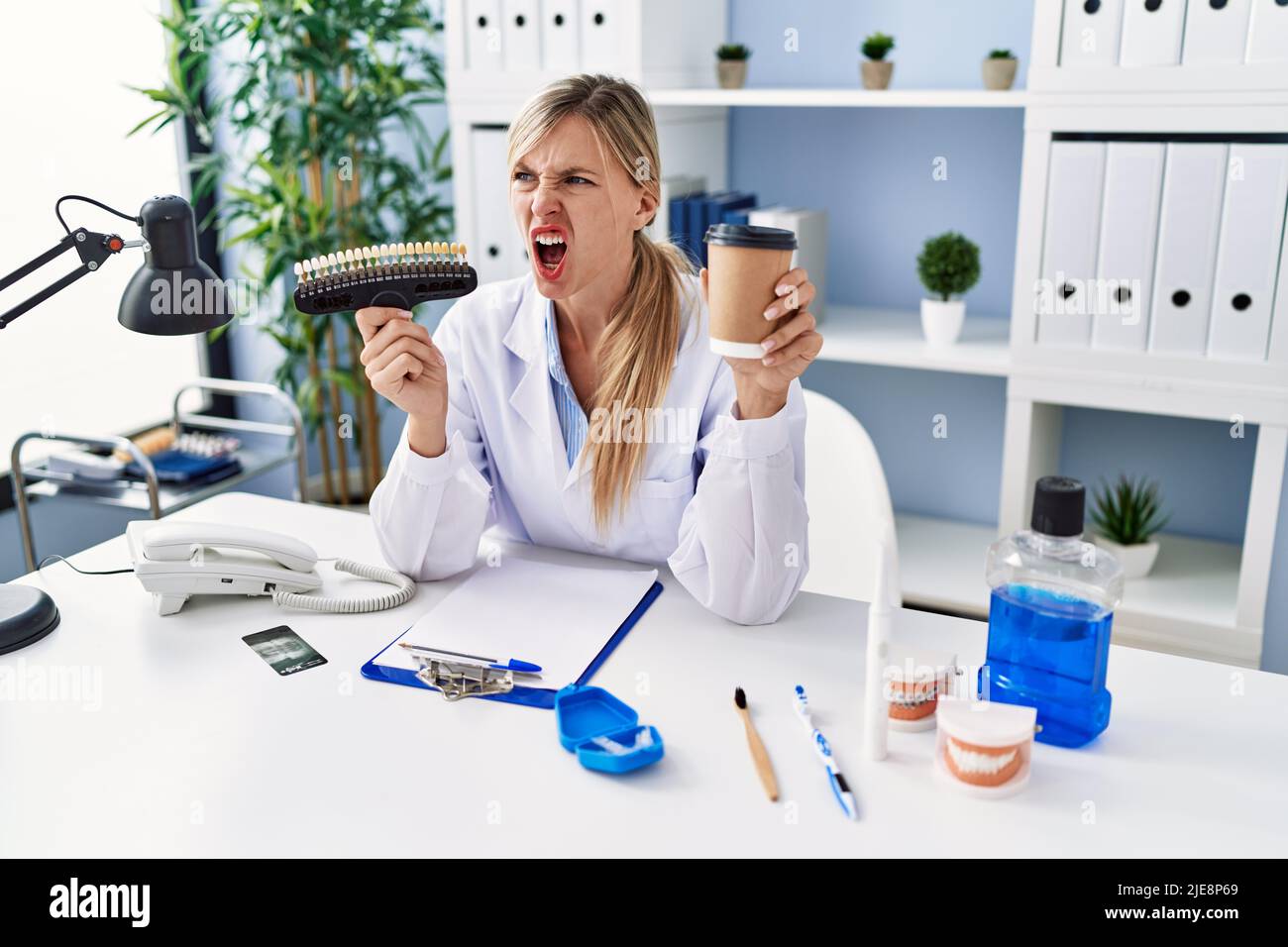Mad woman brushing teeth hi-res stock photography and images - Alamy