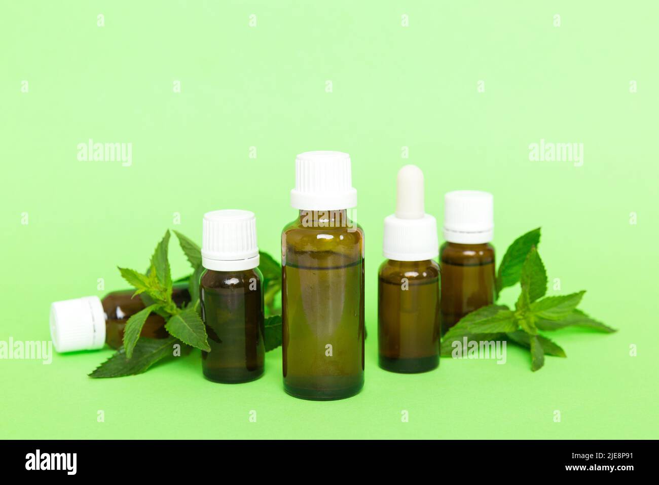 Natural Mint Essential Oil in a Glass Bottle. organic cosmetics with ...