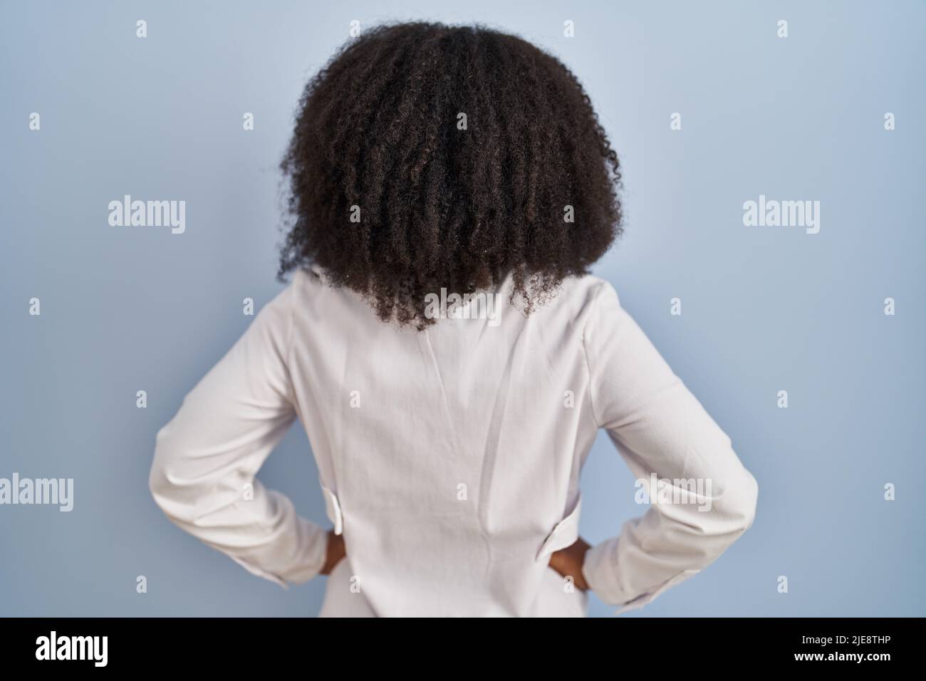 Young african american woman wearing doctor uniform and stethoscope ...