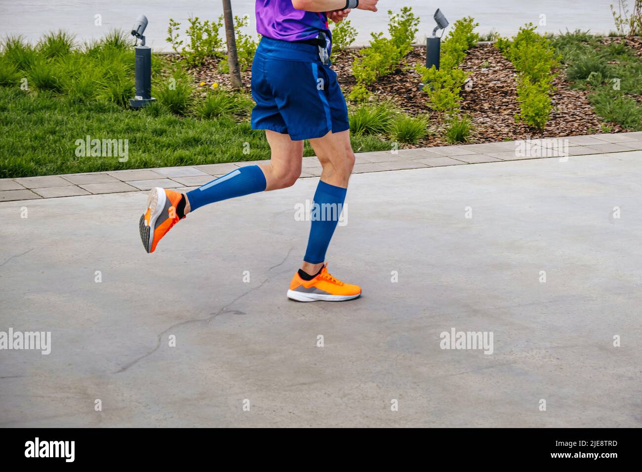 Athlete in blue compression hi-res stock photography and images - Alamy