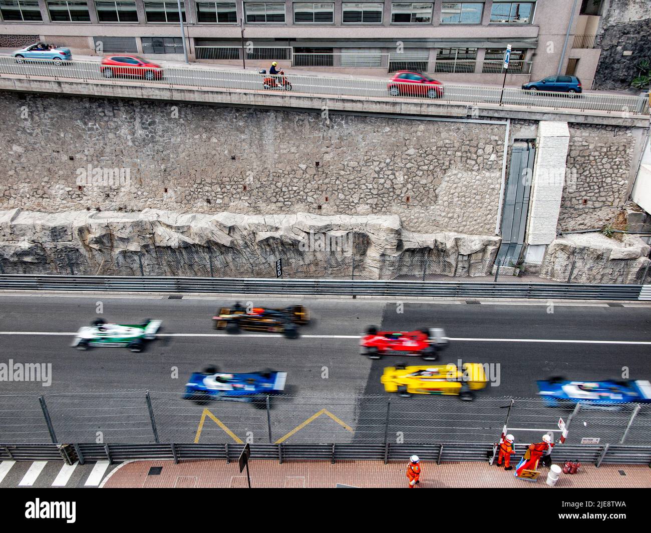 Historic formula one grand prix cars on the Monaco circuit with regular ...