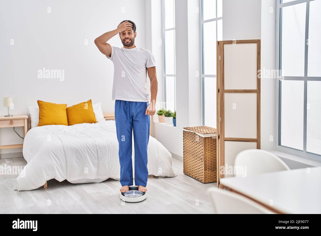 Man scale weight worried hi-res stock photography and images - Alamy