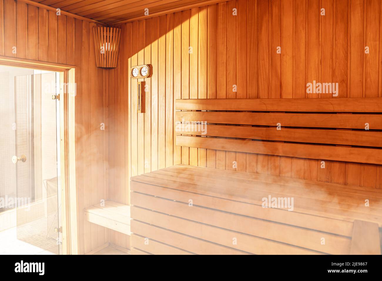 Interior of Finnish sauna, classic wooden sauna with hot steam. Russian ...