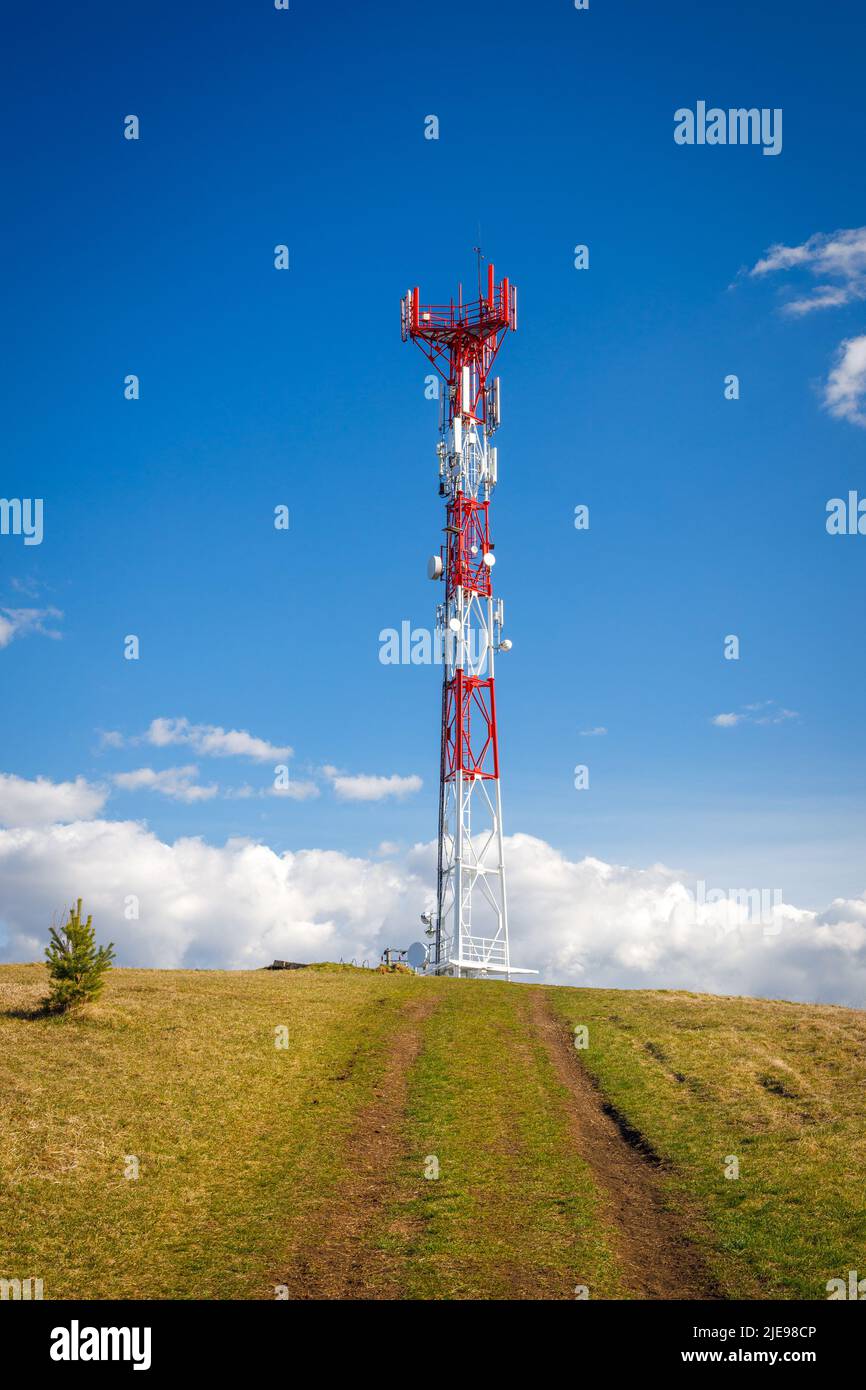 Telecommunication tower with antennas on top of hill Stock Photo - Alamy