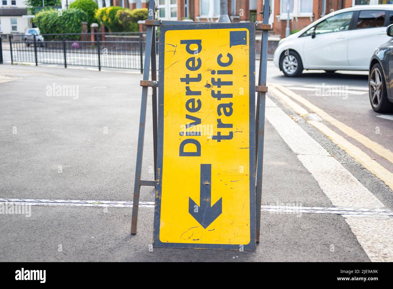 Diverted traffic sign, pointing to the ground. Diversion arrow ...